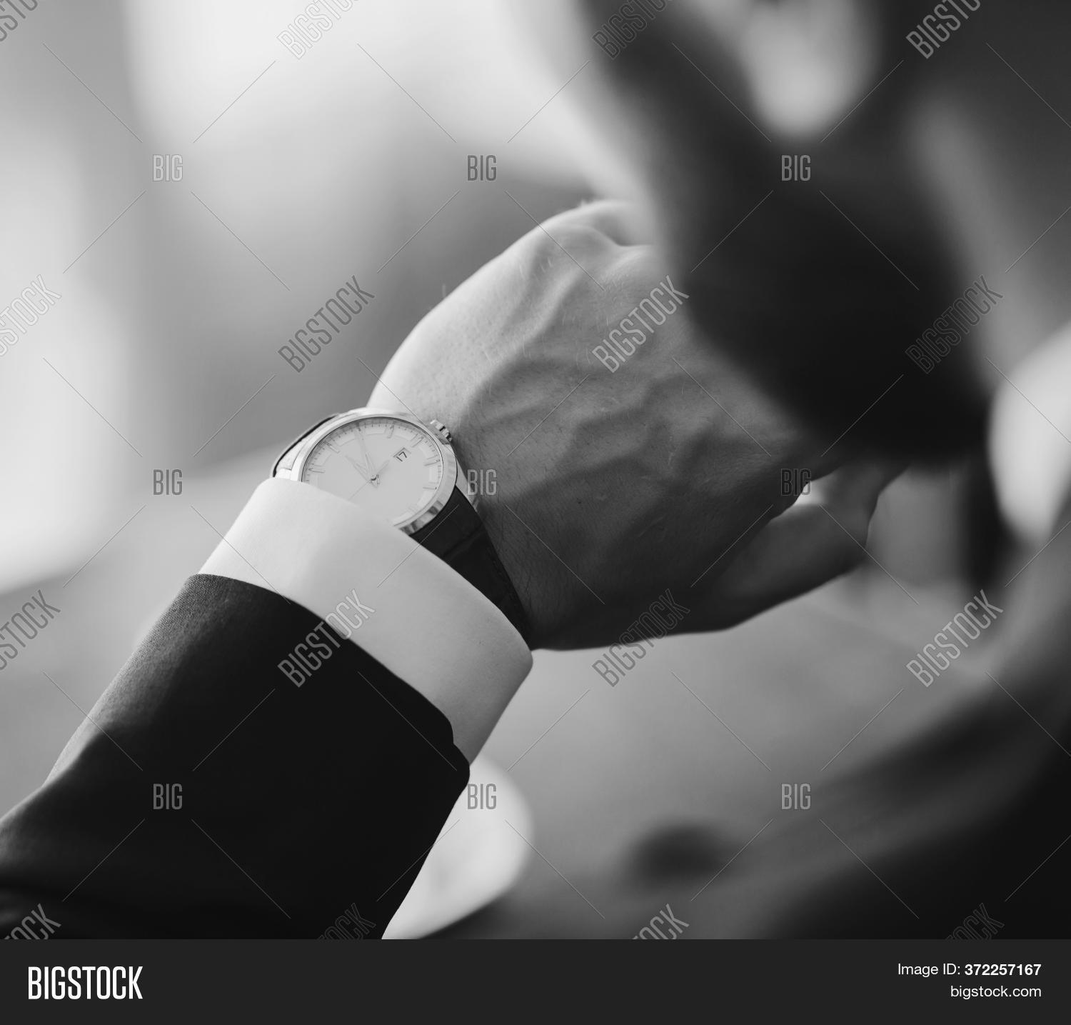 Man Checking Time On Image & Photo (Free Trial) | Bigstock