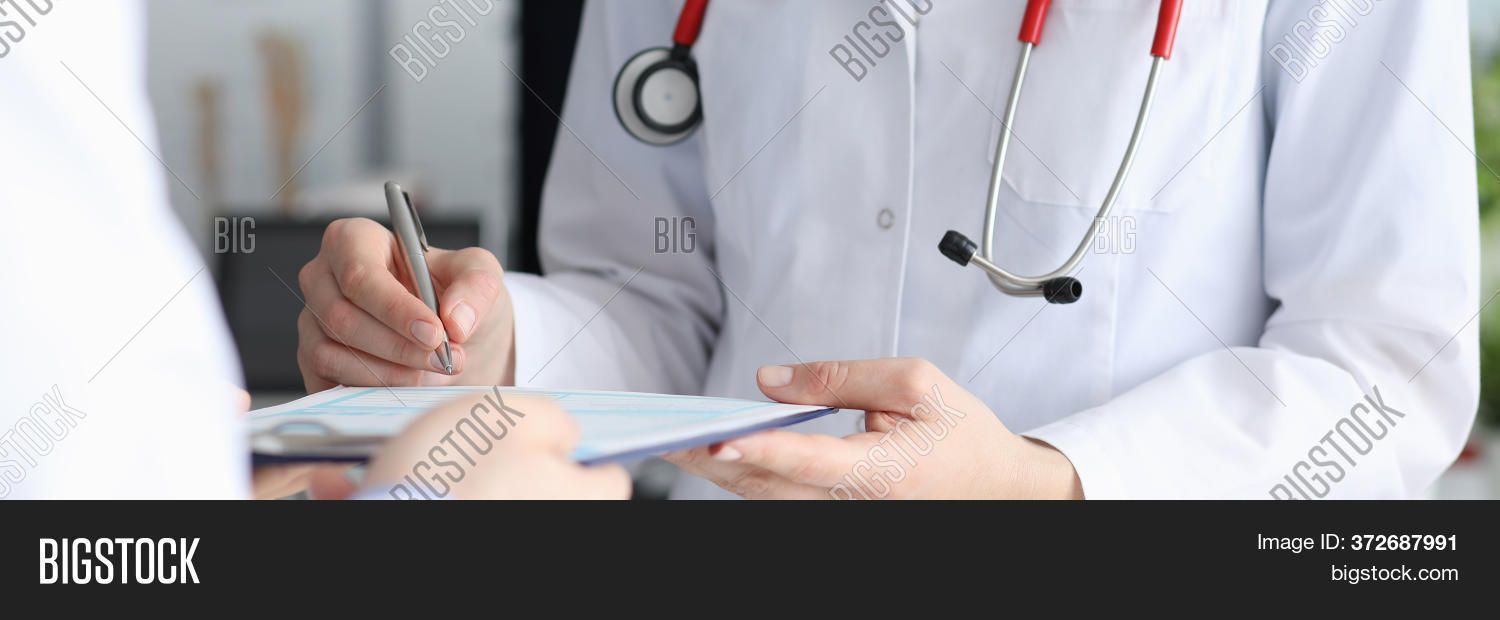 Female Doctor Signs Image & Photo (Free Trial) | Bigstock
