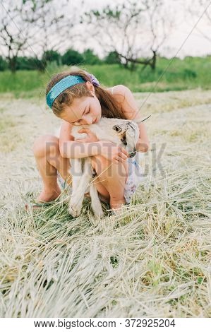 Girl Baby Goat On Farm Image & Photo (Free Trial) | Bigstock