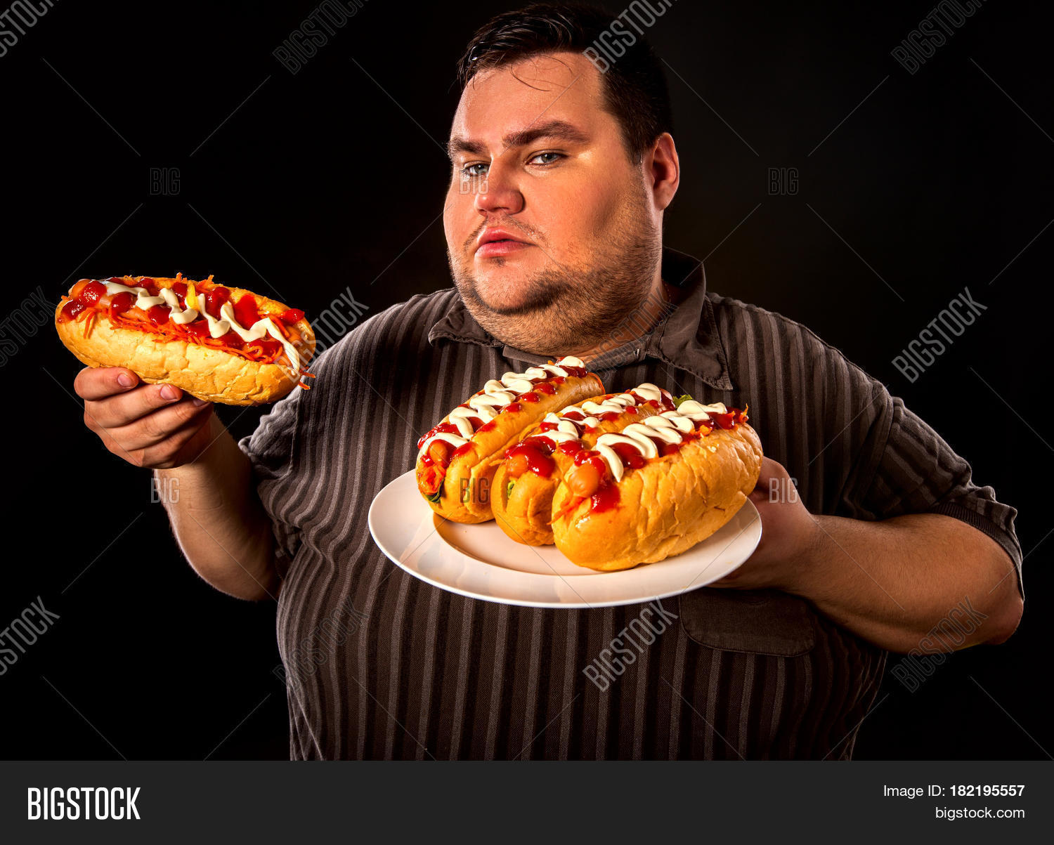 Fat Man Eating Chili Dogs