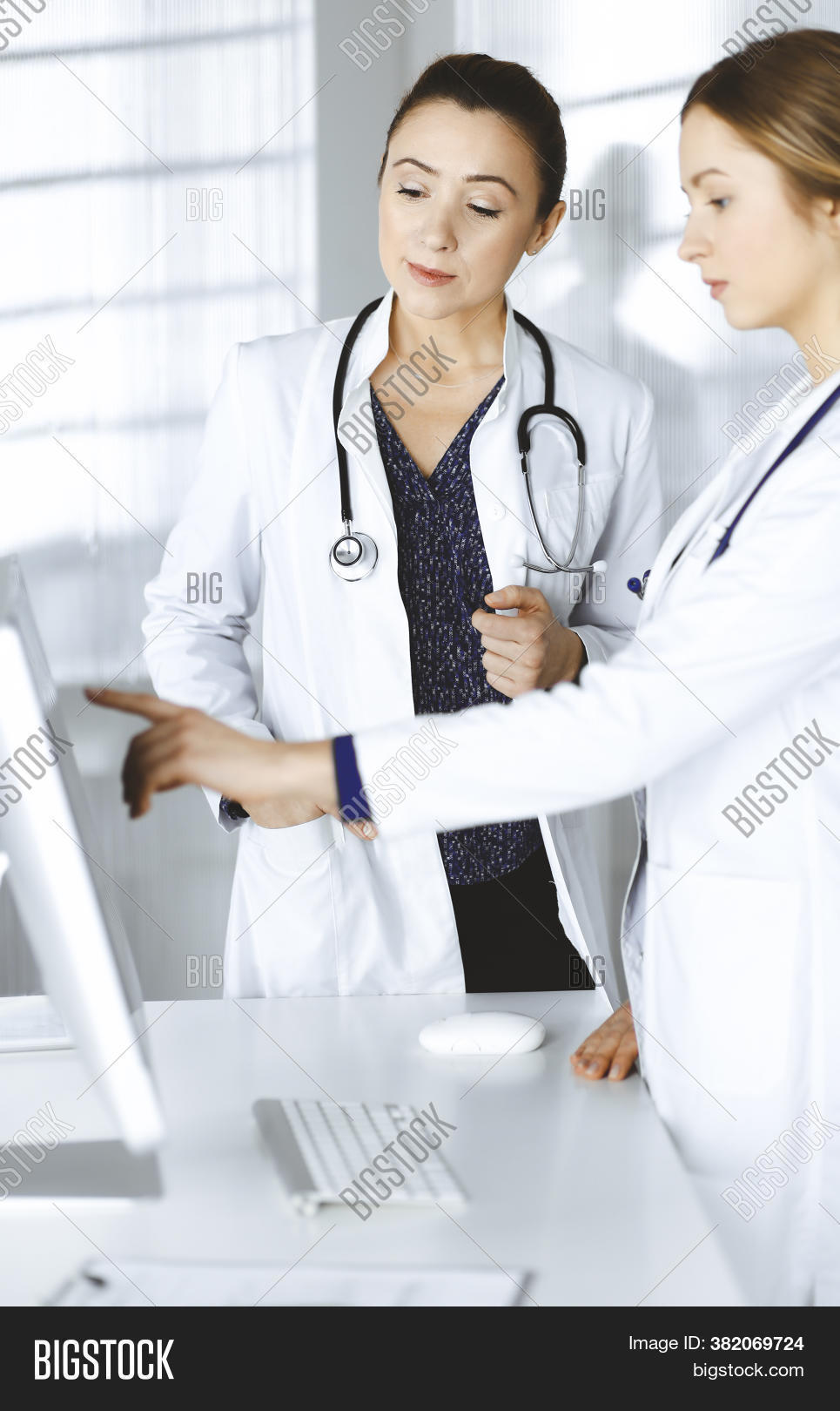 Two Female Physicians Image & Photo (Free Trial) | Bigstock