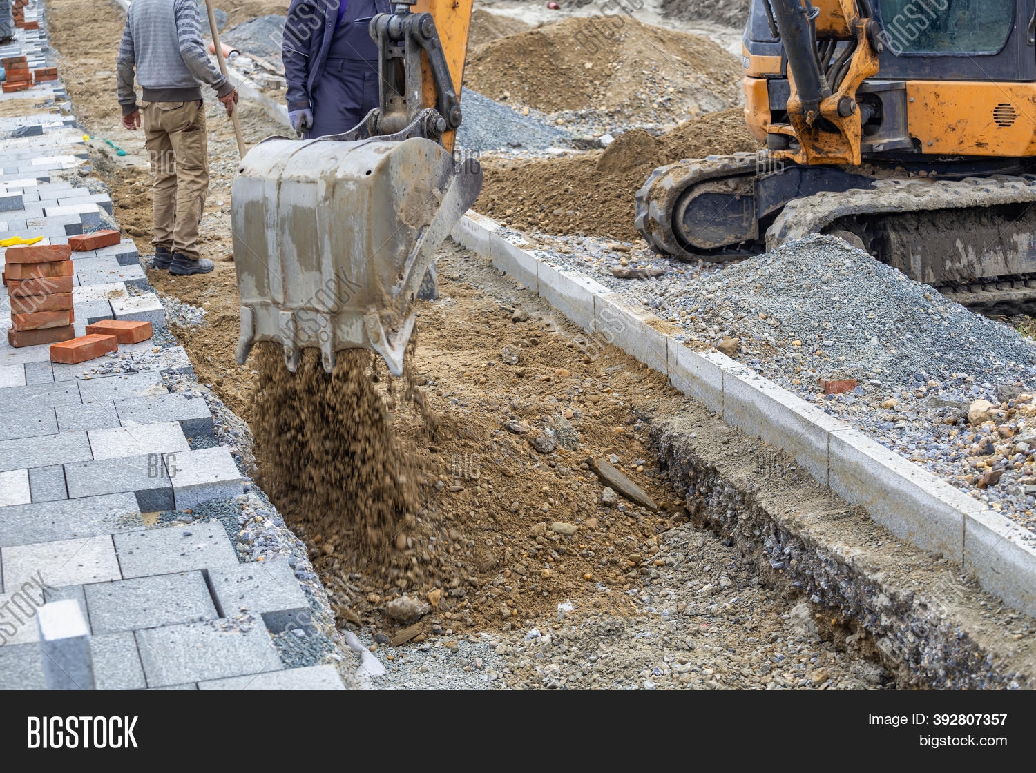 Workers Backfilling Image & Photo (Free Trial) | Bigstock