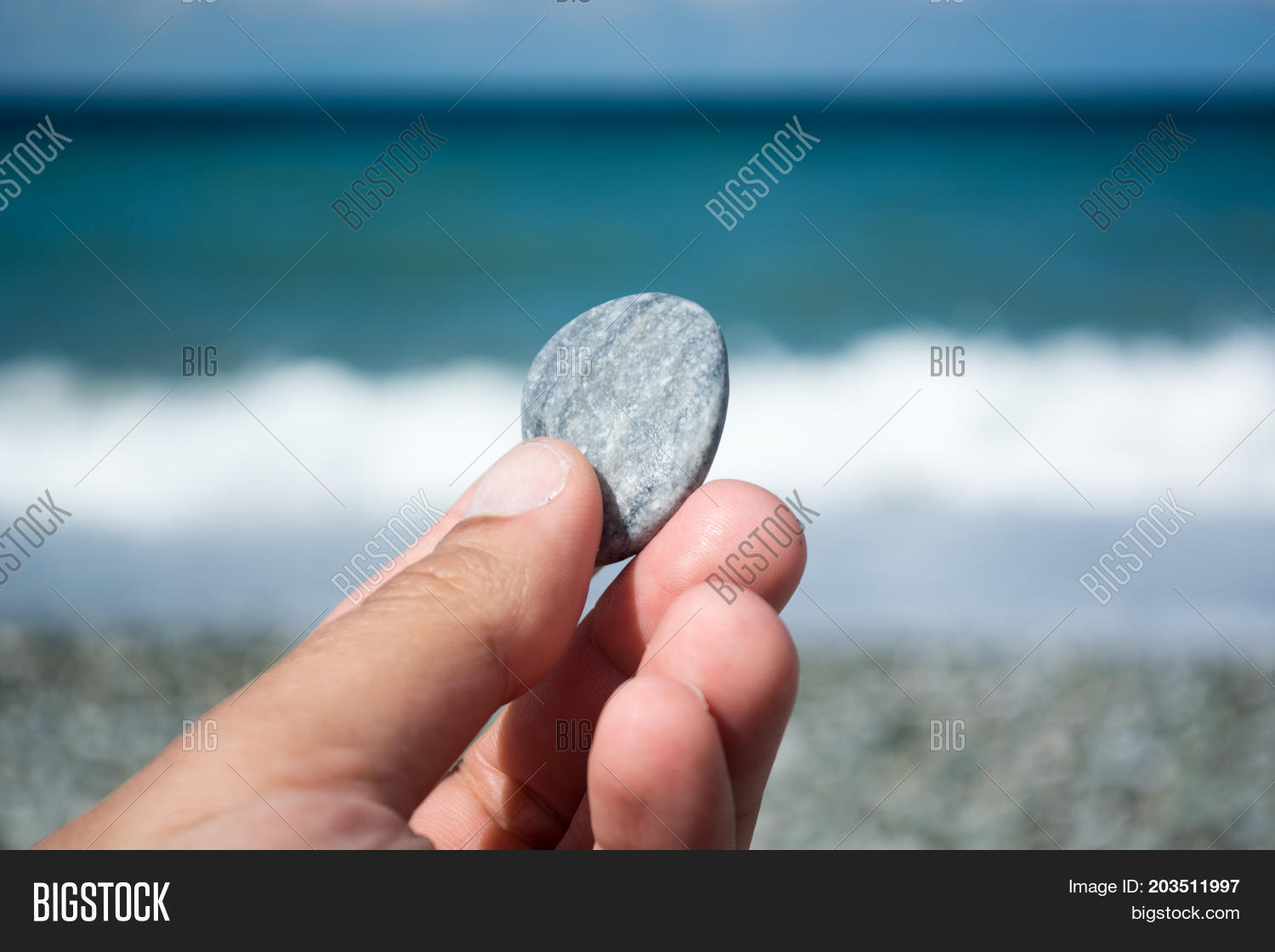 Hand Small Stone On Image & Photo (Free Trial) | Bigstock