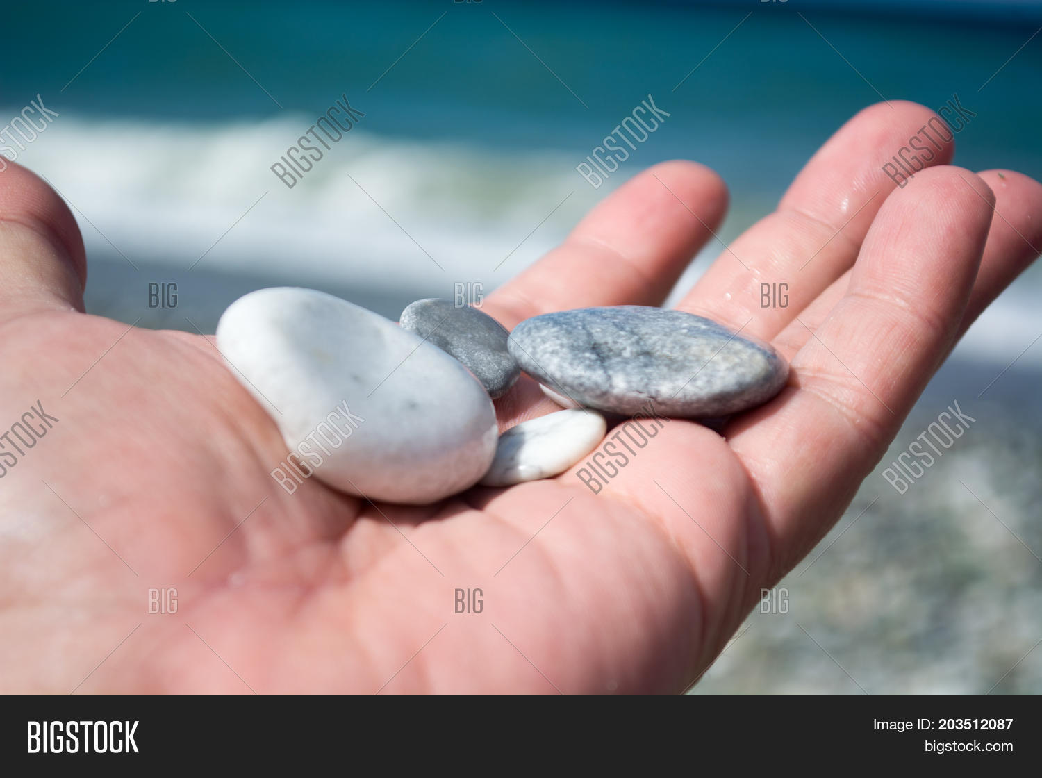 Hand Small Stones On Image & Photo (Free Trial) | Bigstock
