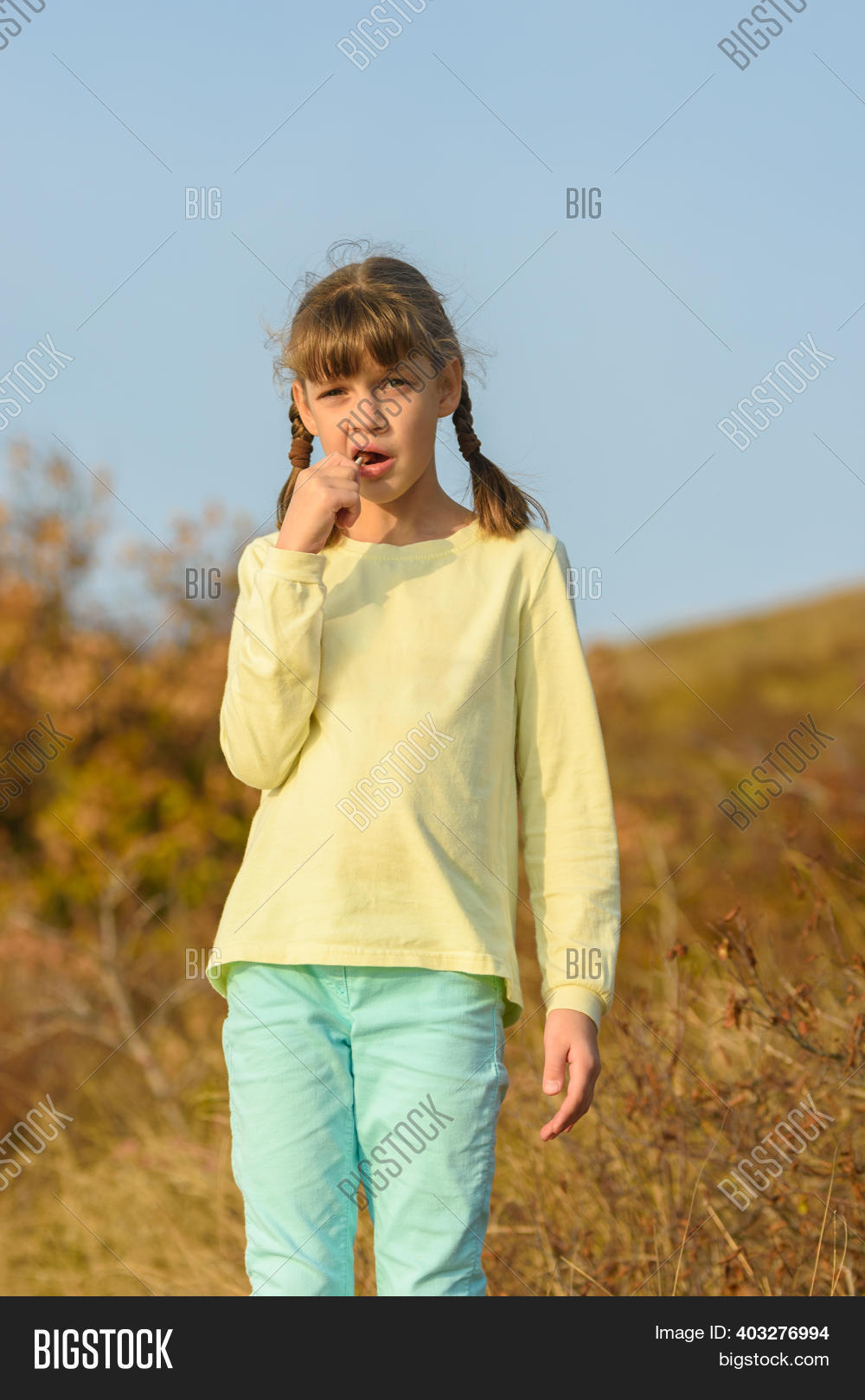 Girl Nibbles On Image & Photo (Free Trial) | Bigstock