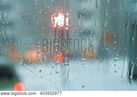 Drops From Snow And Rain Flow Down The Windshield. Poor Visibility On ...