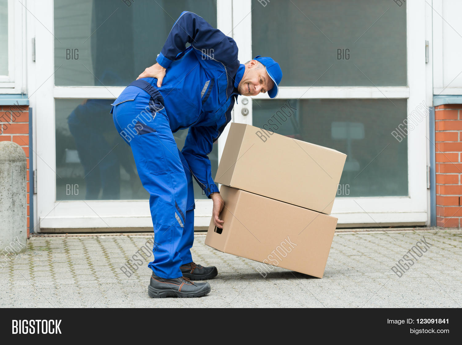 Delivery Man Suffering Image & Photo (Free Trial) | Bigstock