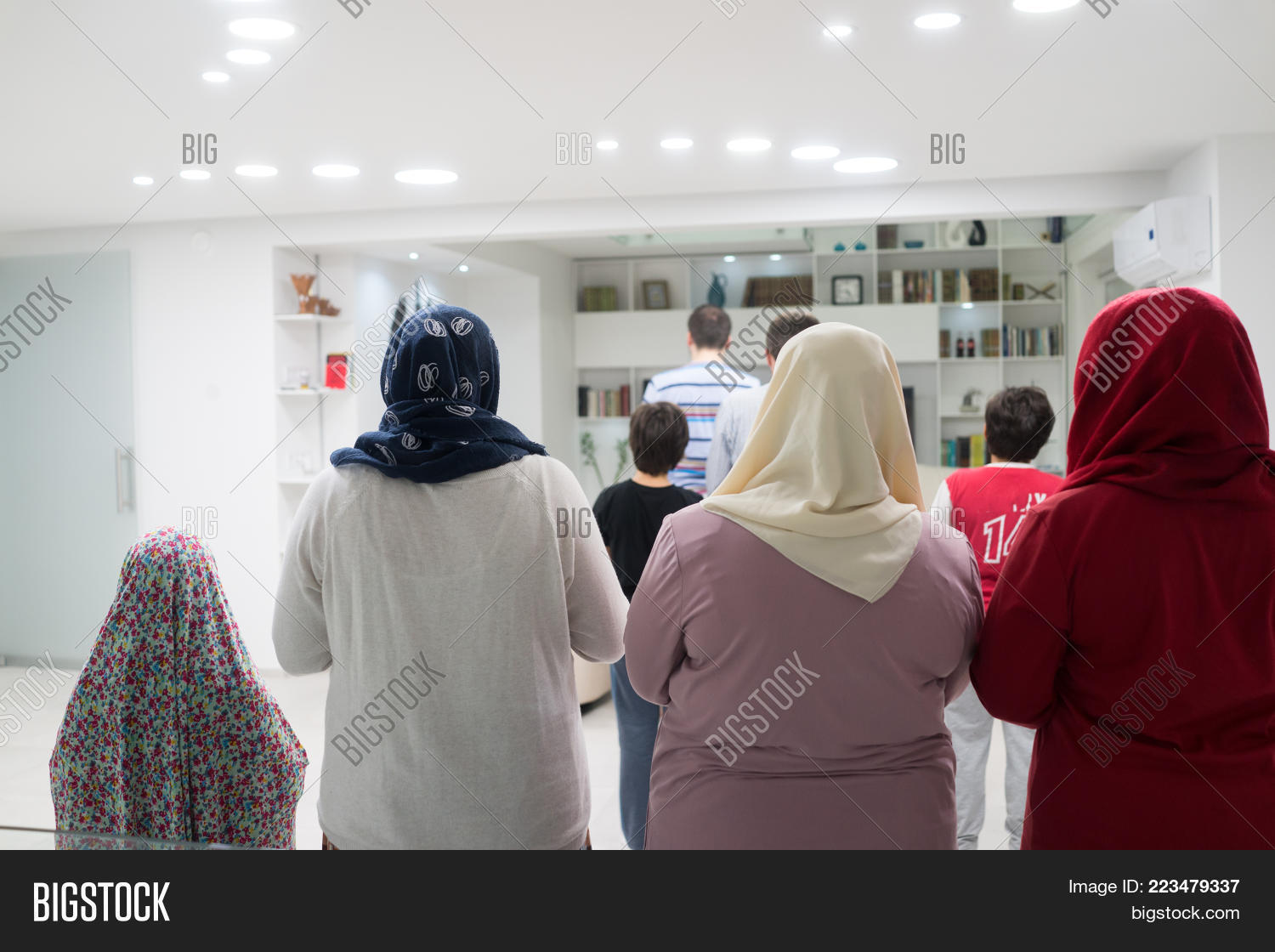 Muslim Family Praying Together