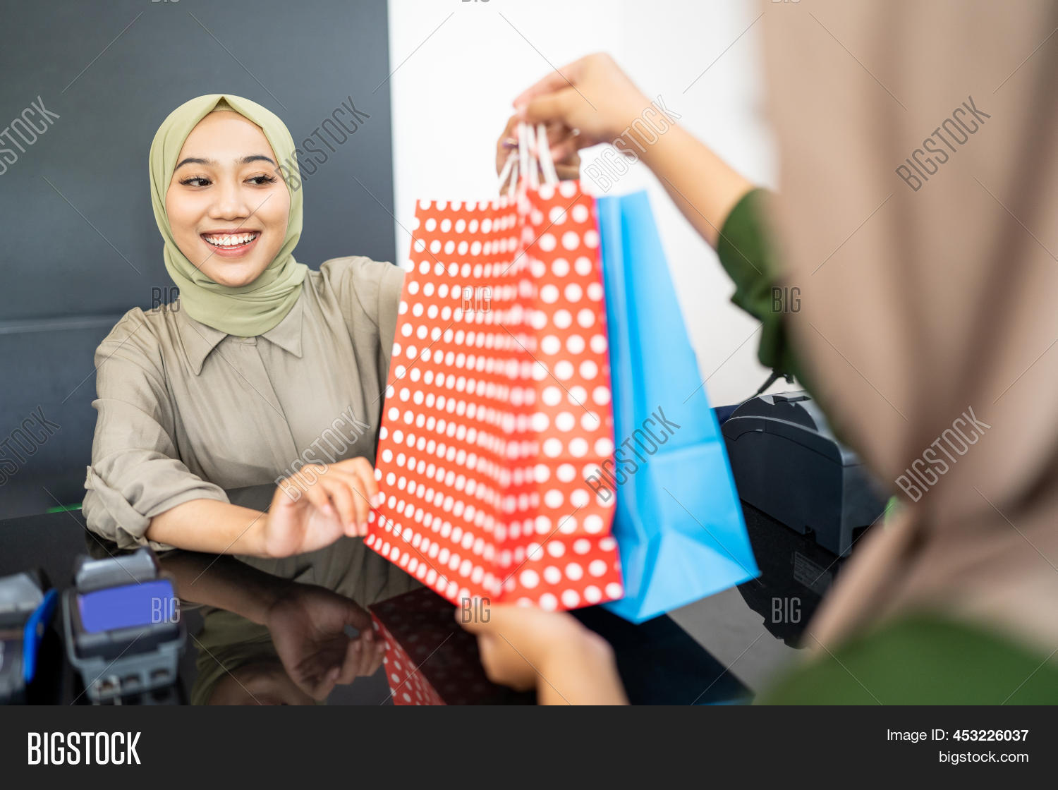 Muslim Cashier Worker Image & Photo (Free Trial) | Bigstock