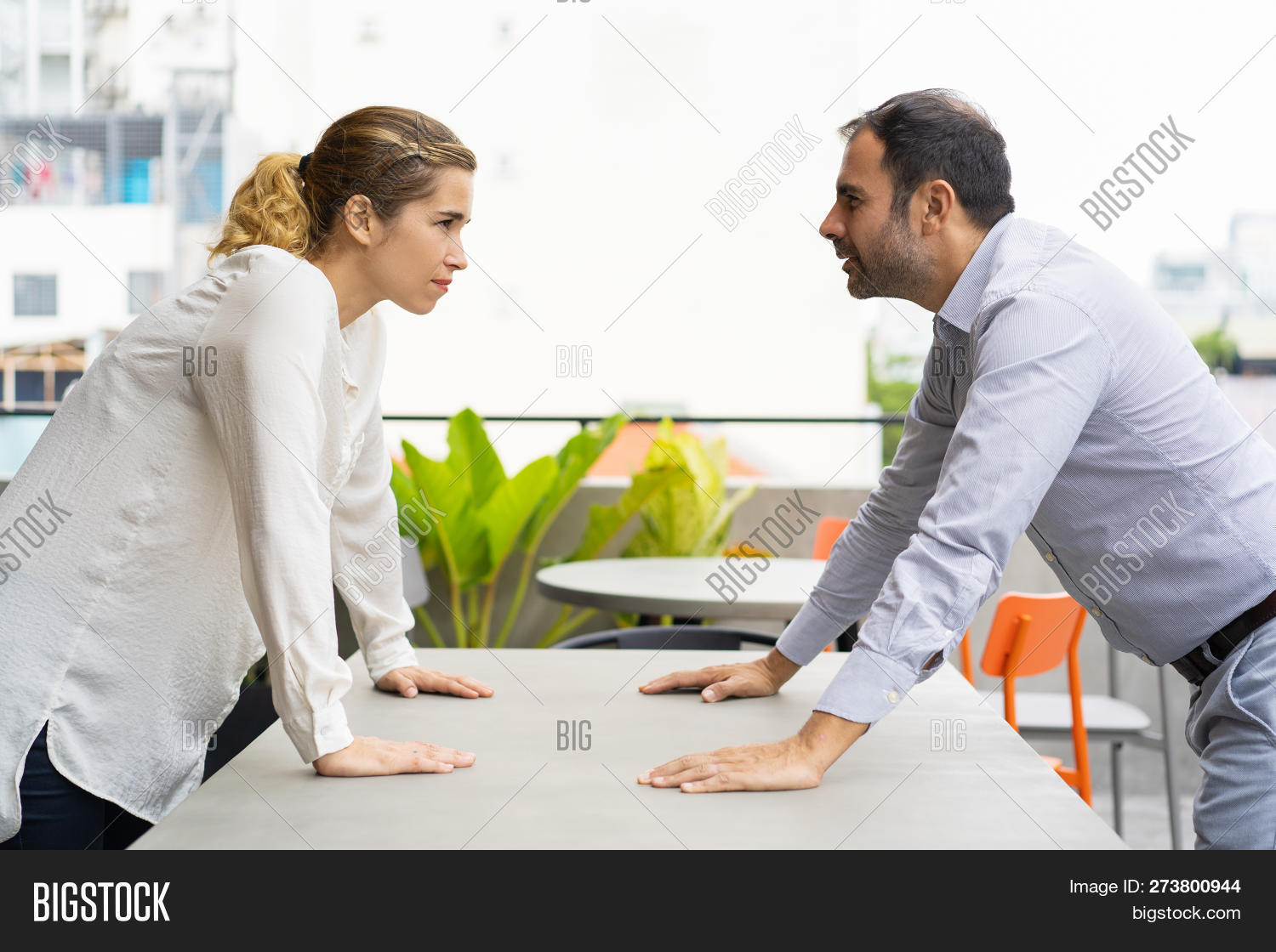 Two People Staring At Each Other