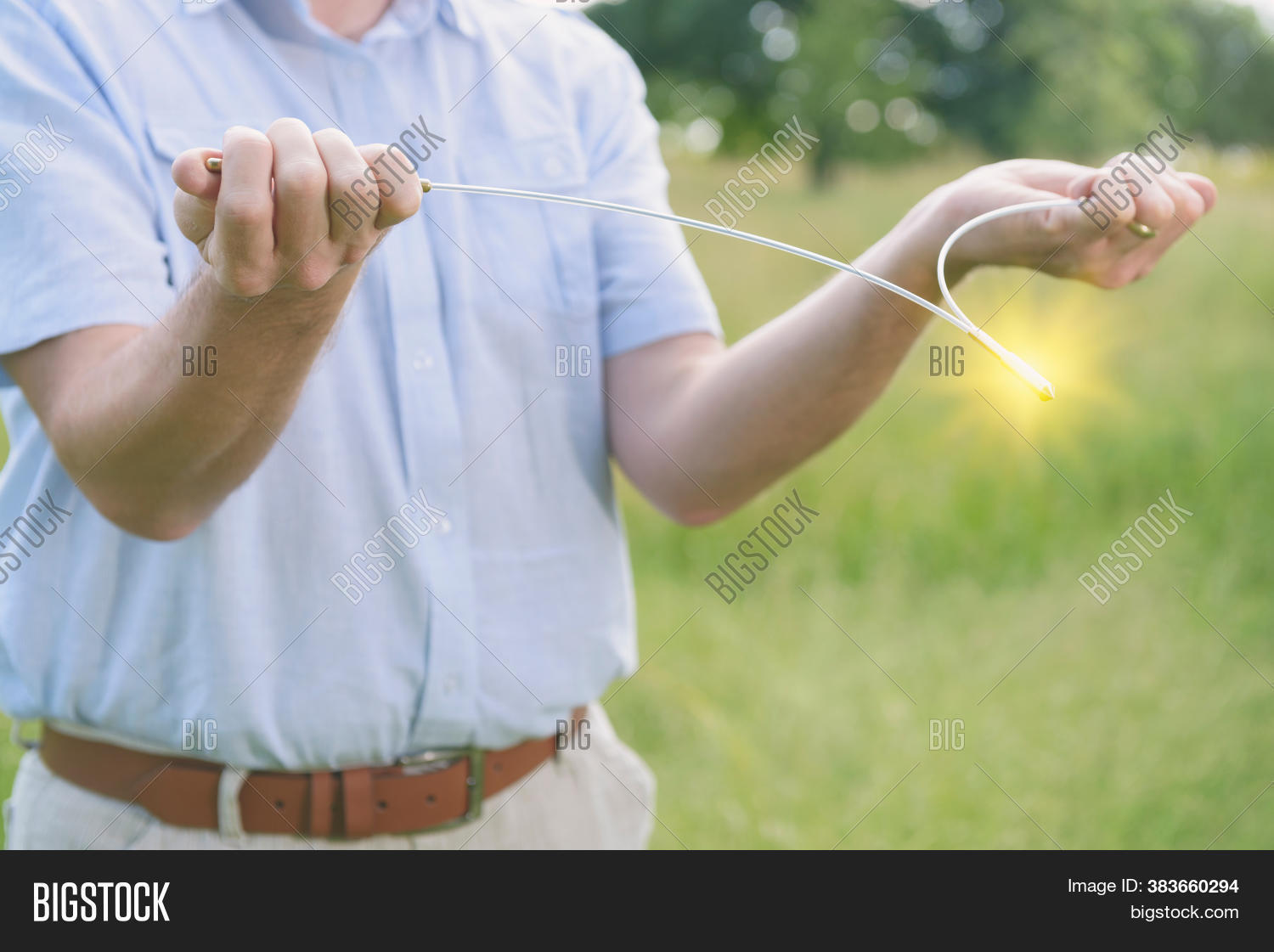 Man Dowsing Wirh Image & Photo (Free Trial) | Bigstock