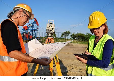 Two Surveyors Work On Image & Photo (Free Trial) | Bigstock