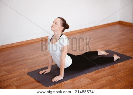 Yoga Concept. Close up woman meditates while practicing yoga in ...