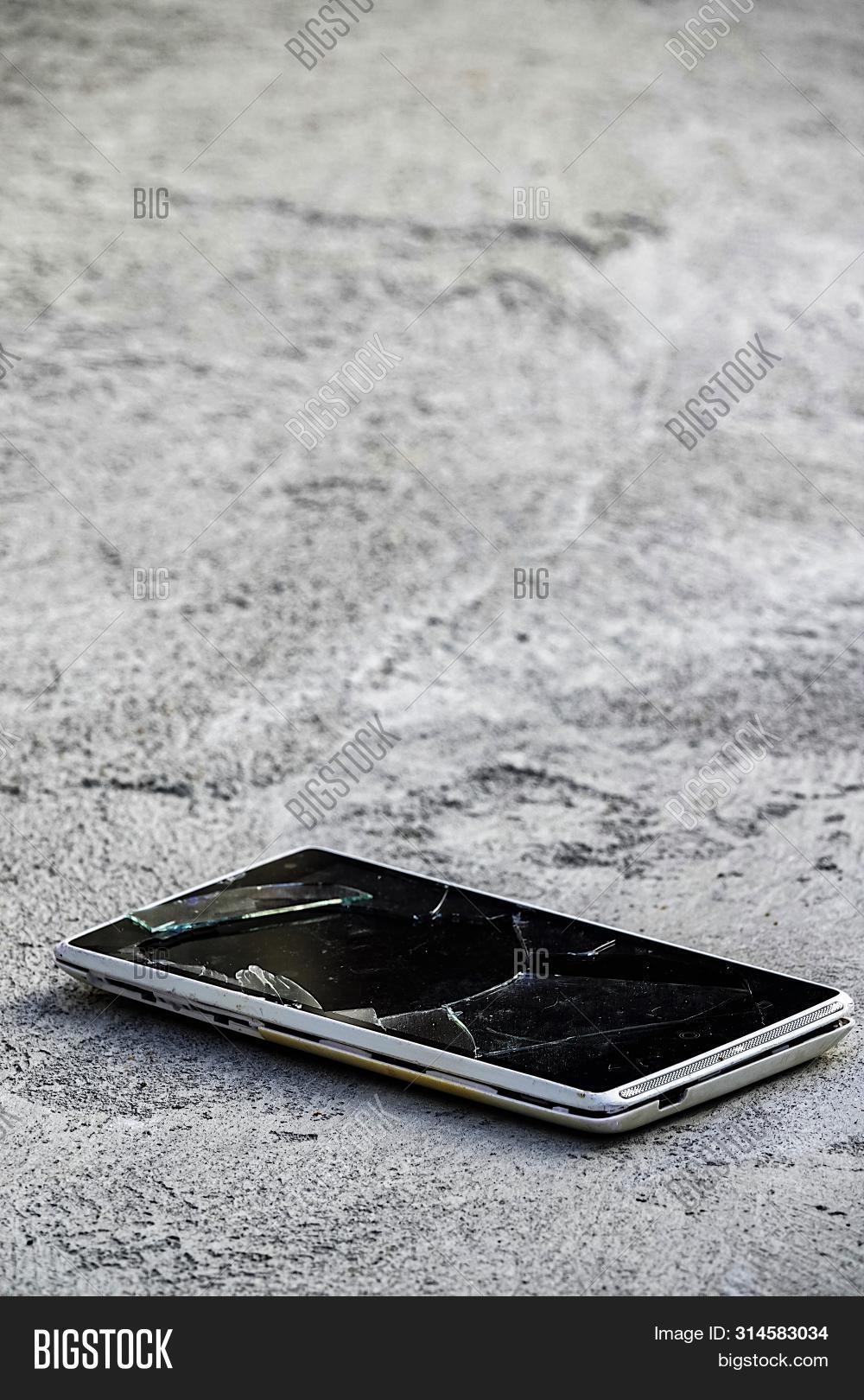 Smartphone Fell On Image & Photo (Free Trial) | Bigstock