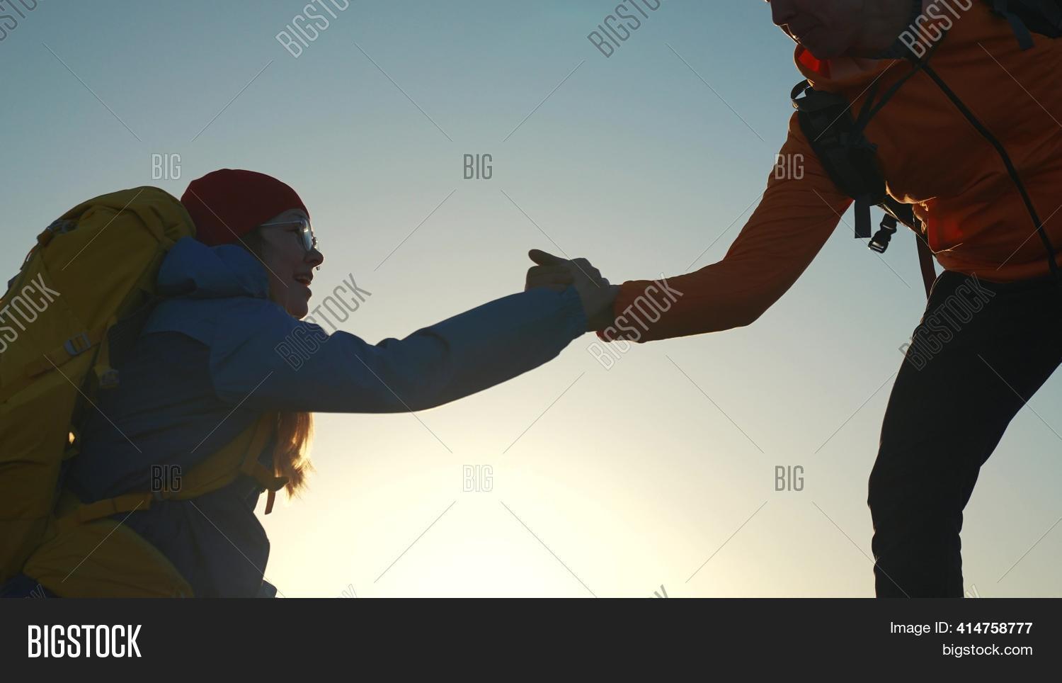 Teamwork. Help Image & Photo (Free Trial) | Bigstock