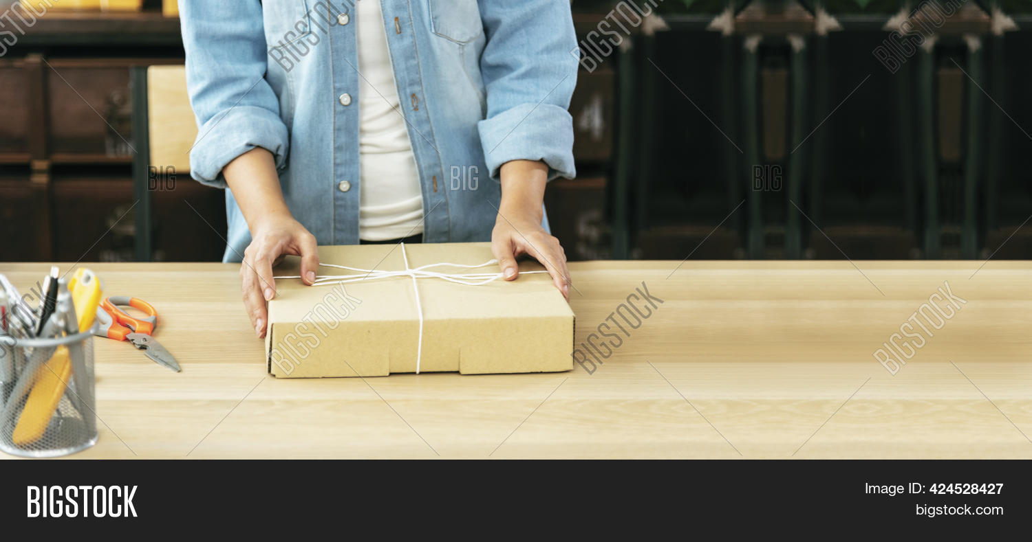 Woman Packing Box On Image & Photo (Free Trial) | Bigstock