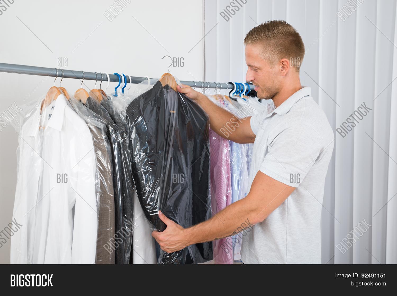 Young Man Dry Cleaning Image & Photo (Free Trial) | Bigstock