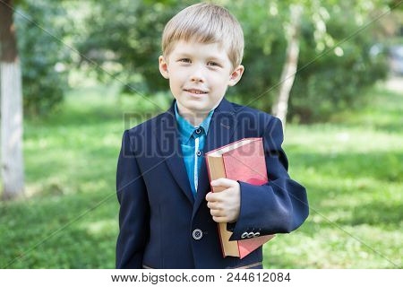 Boy Book His Hand. Boy Image & Photo (Free Trial) | Bigstock