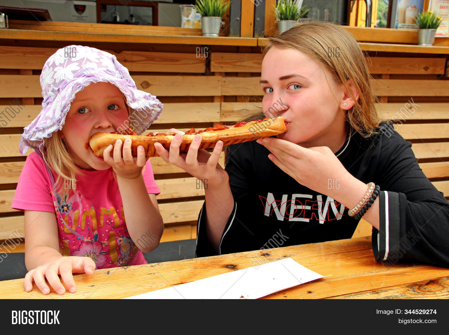 Two Girls Eat One Big Image & Photo (Free Trial) | Bigstock