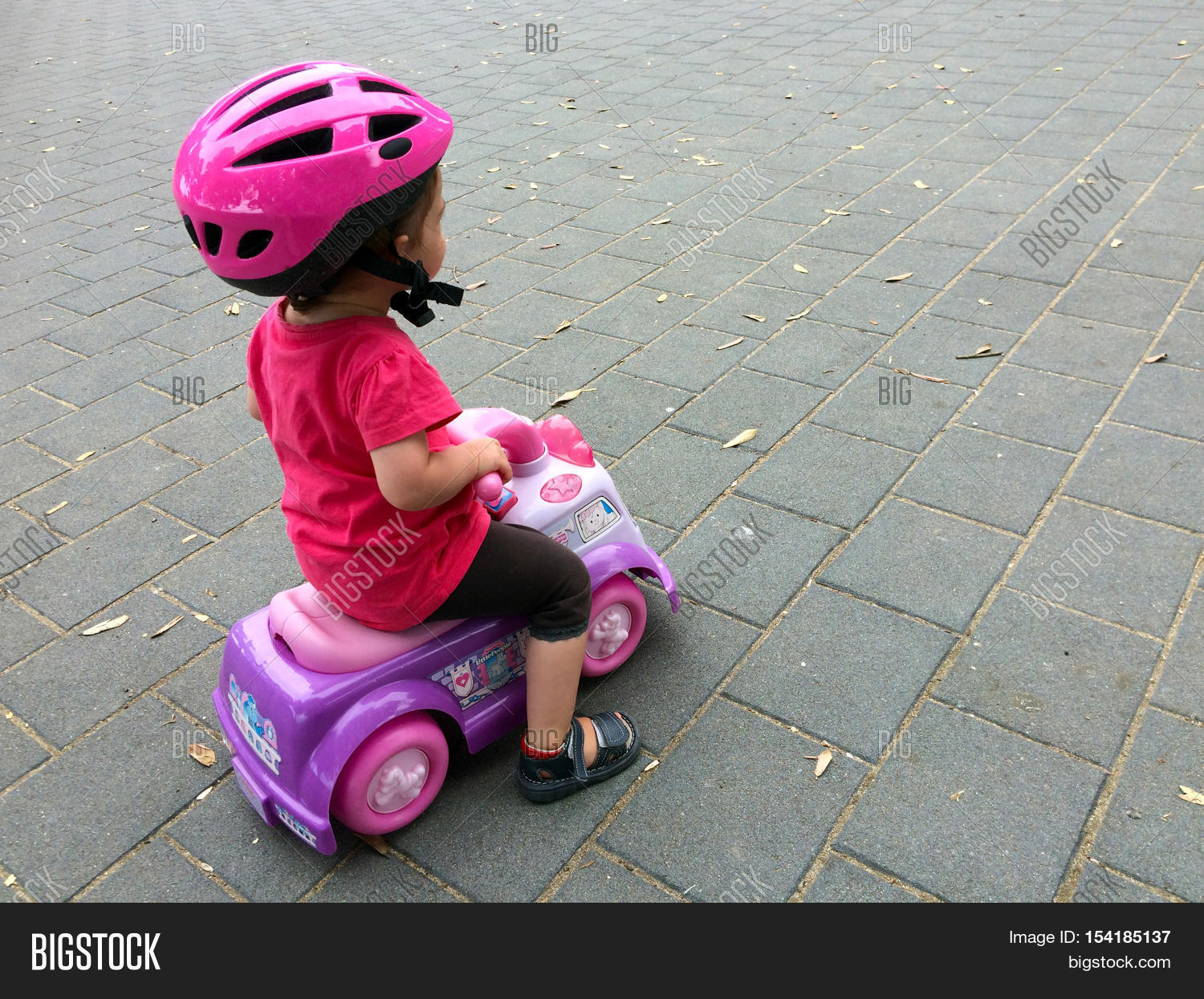 Little Girl Riding Toy Image & Photo (Free Trial) | Bigstock