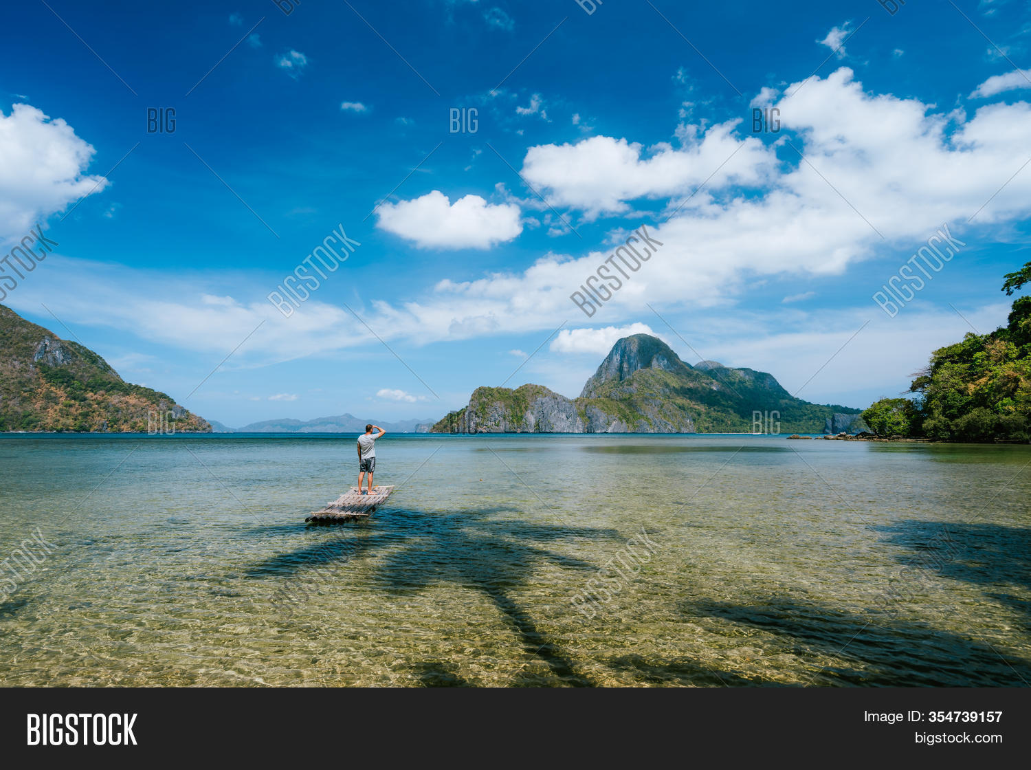 Man On Bamboo Float Image & Photo (Free Trial) | Bigstock