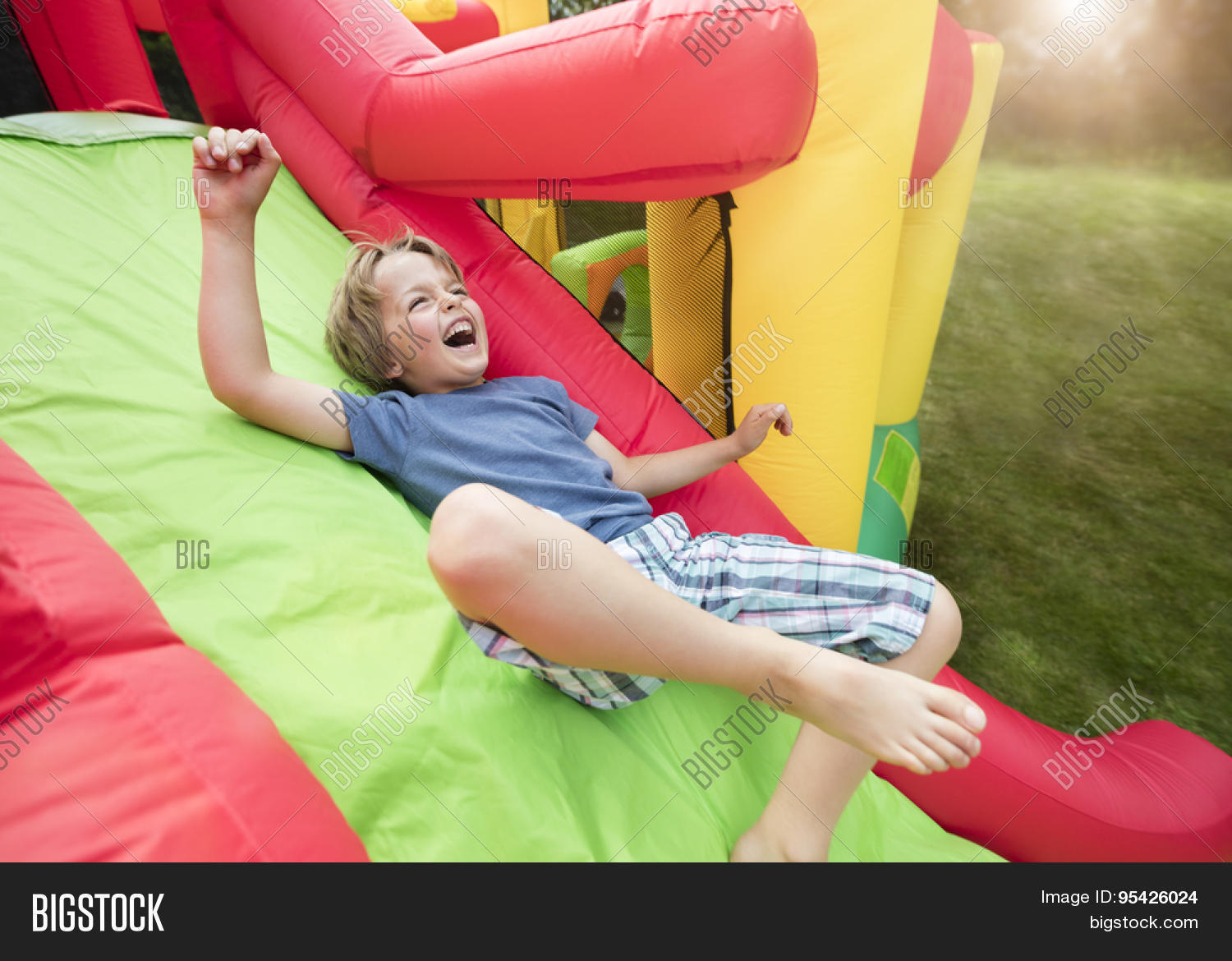 Boy Jumping Down Slide Image & Photo (Free Trial) | Bigstock