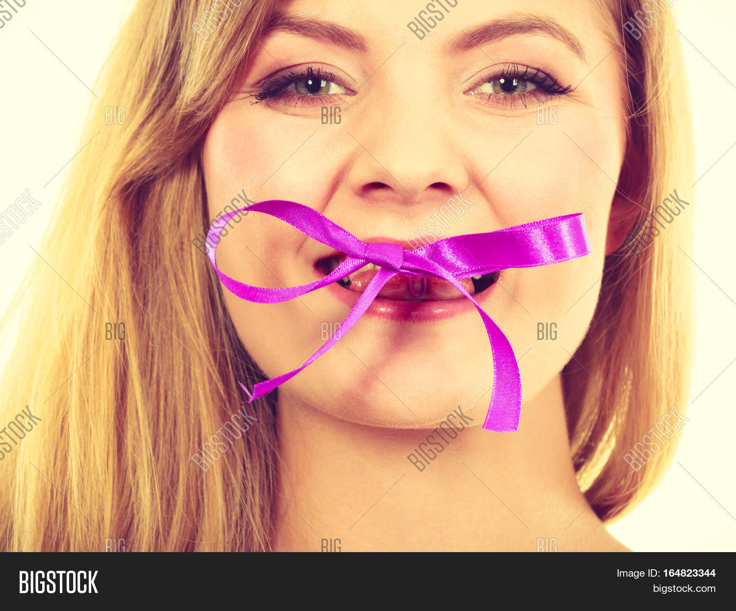 Blonde Woman Biting Image & Photo (Free Trial) | Bigstock