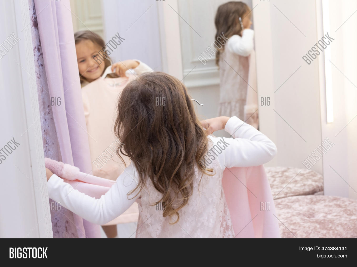 Girl Trying On Clothes Image & Photo (Free Trial) | Bigstock