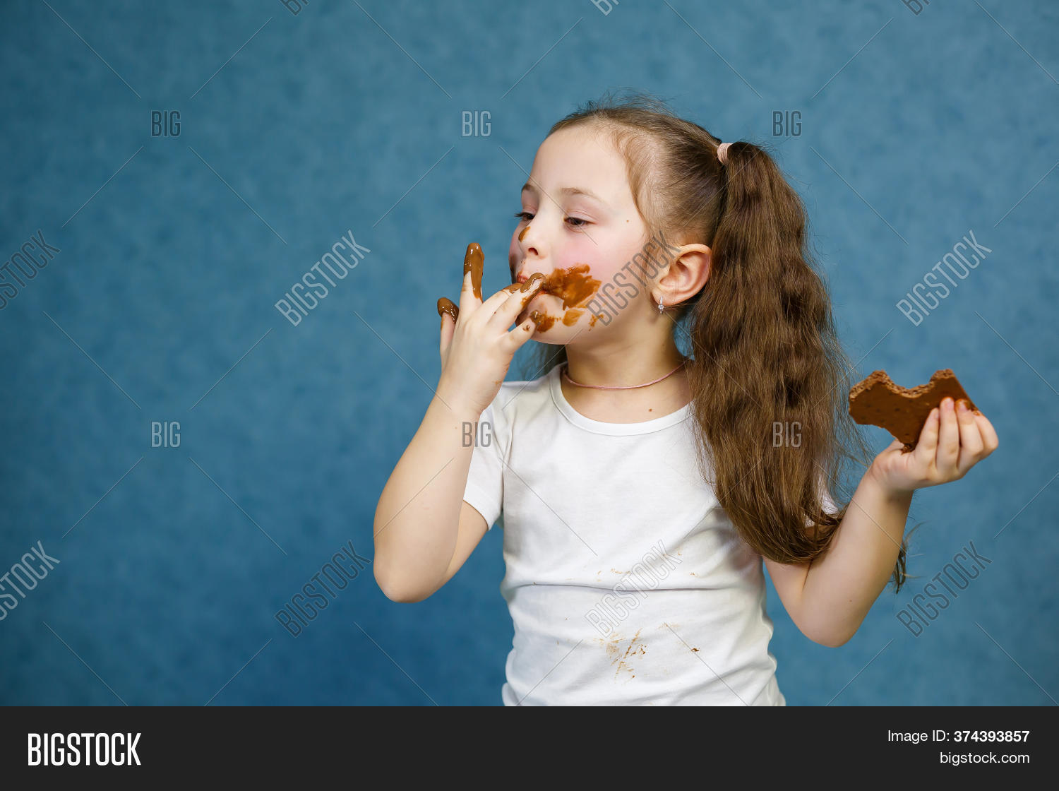 Little Girl Eats Image & Photo (Free Trial) | Bigstock
