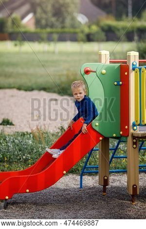 Cute Kid Slides On Image & Photo (Free Trial) | Bigstock