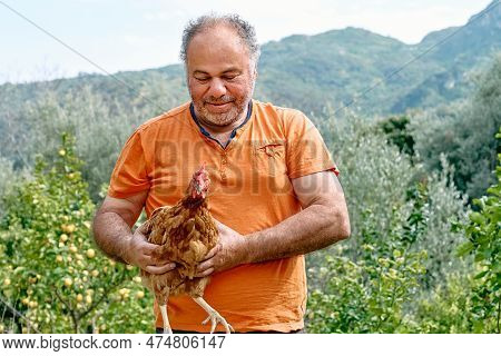 Man Holding Hen His Image & Photo (Free Trial) | Bigstock