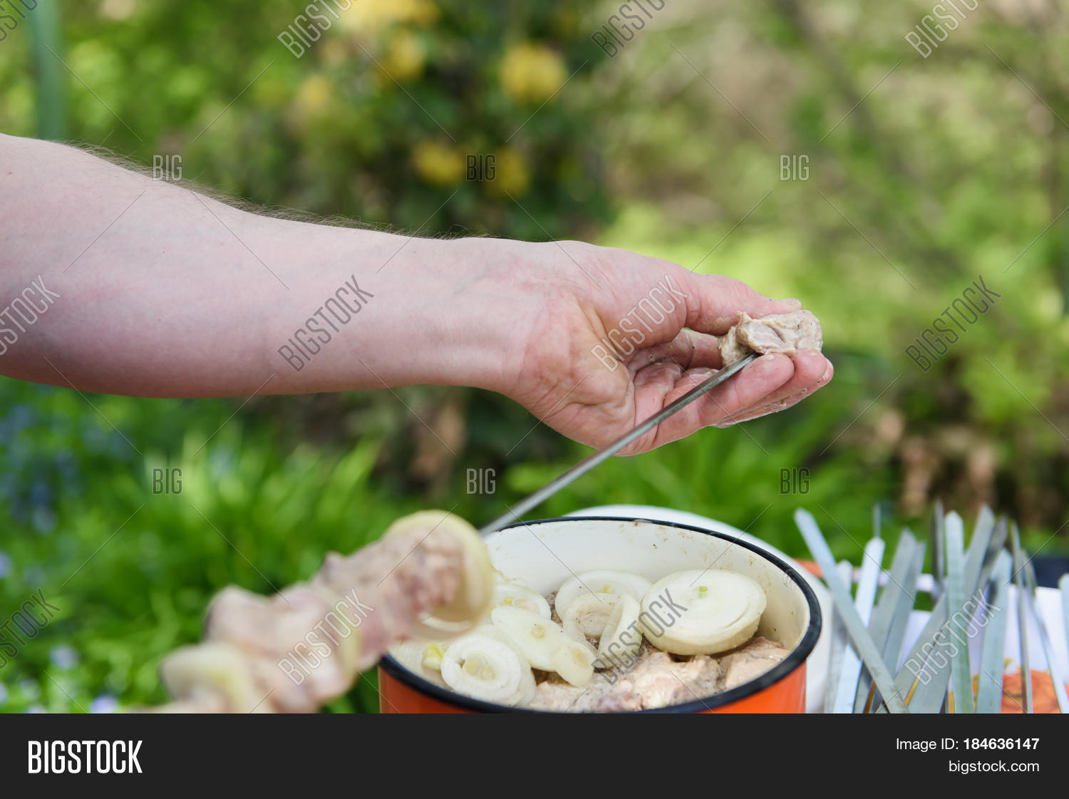 Man Stringing Meat On Image & Photo (Free Trial) | Bigstock