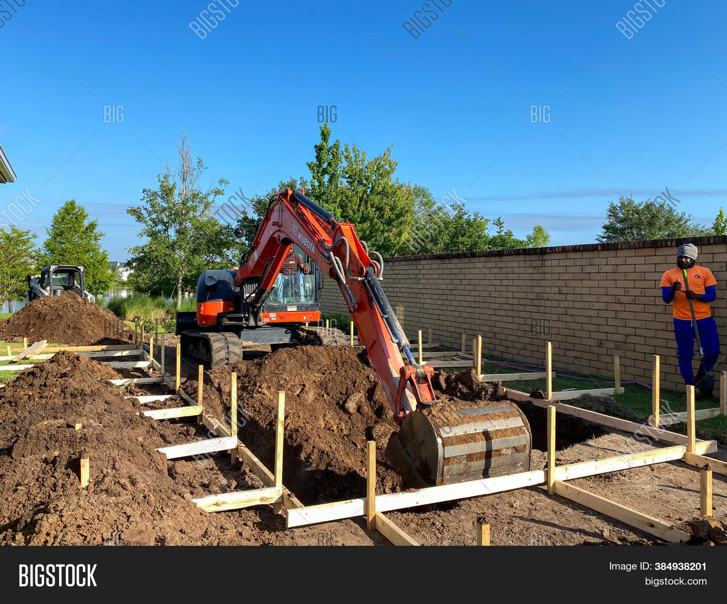 Backhoe Digging Hole Image & Photo (Free Trial) | Bigstock