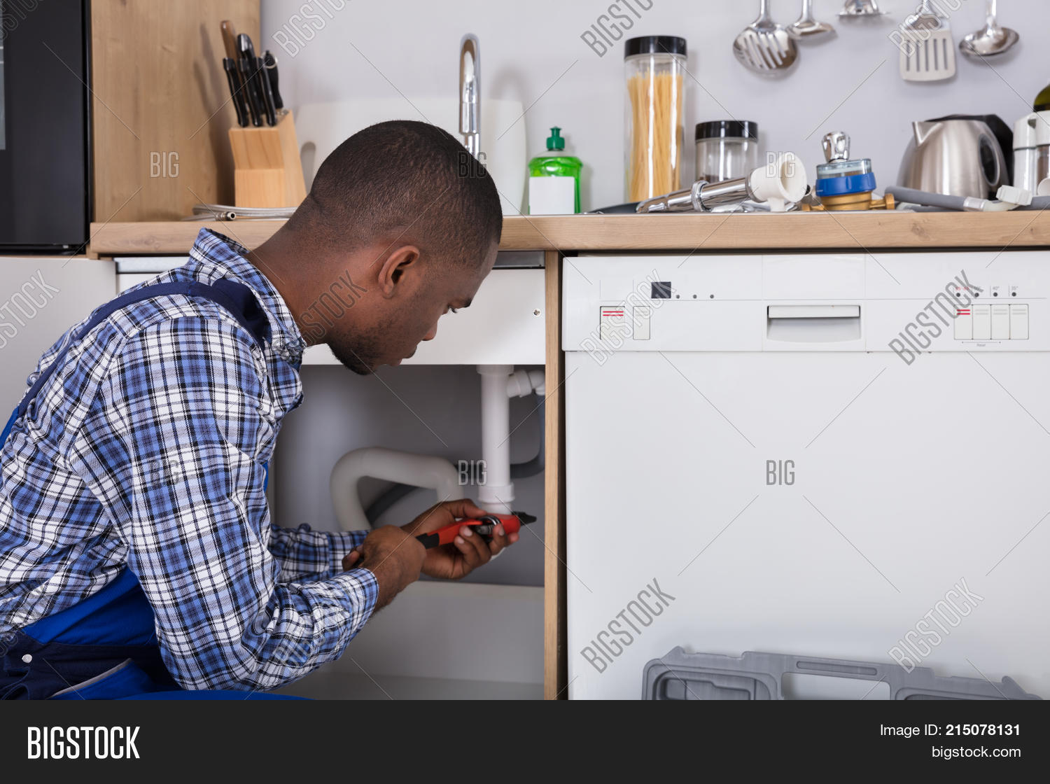 African Male Plumber Image & Photo (Free Trial) | Bigstock