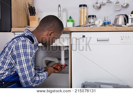 African Male Plumber Image & Photo (Free Trial) | Bigstock