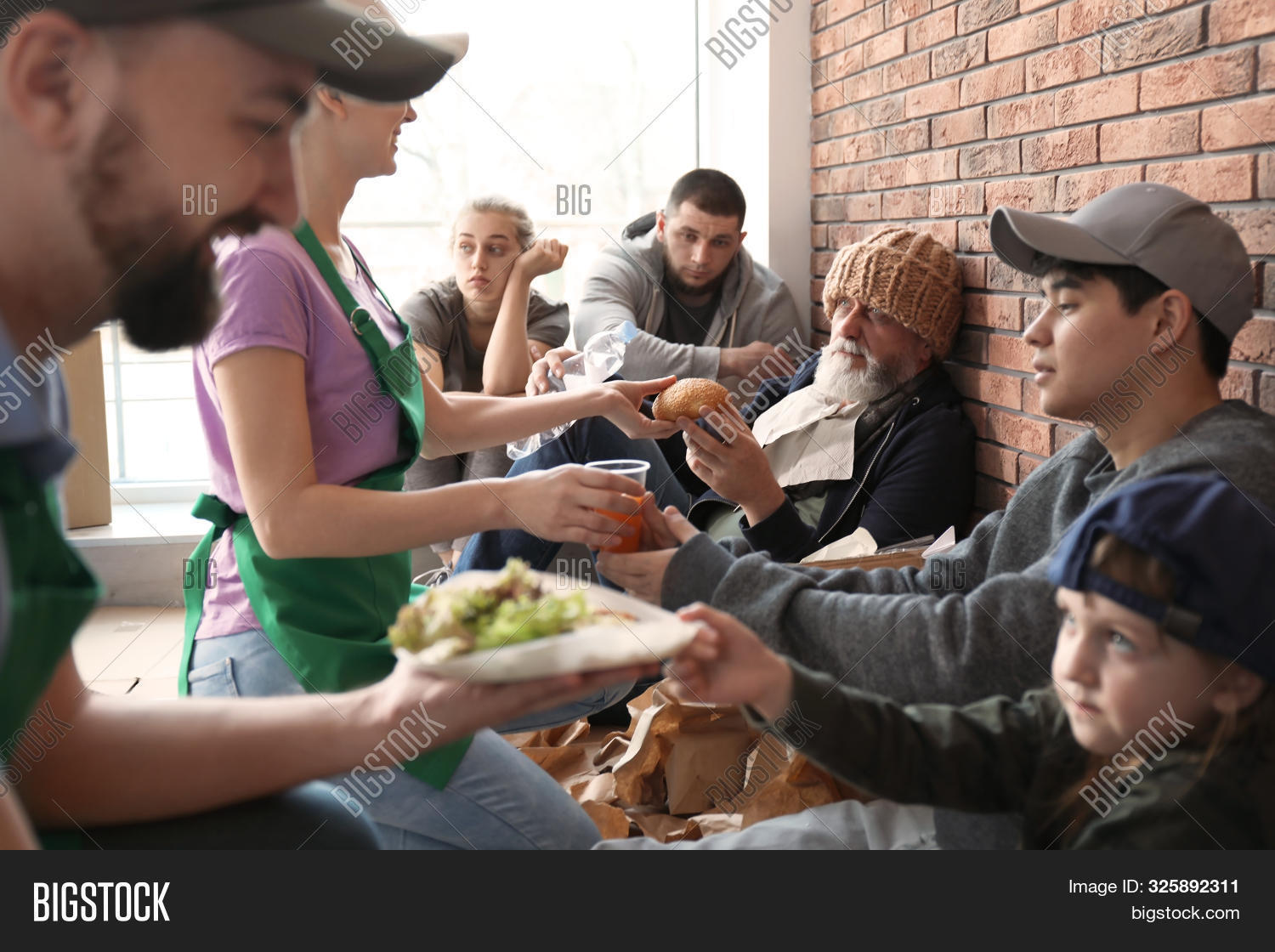 People Giving To The Poor