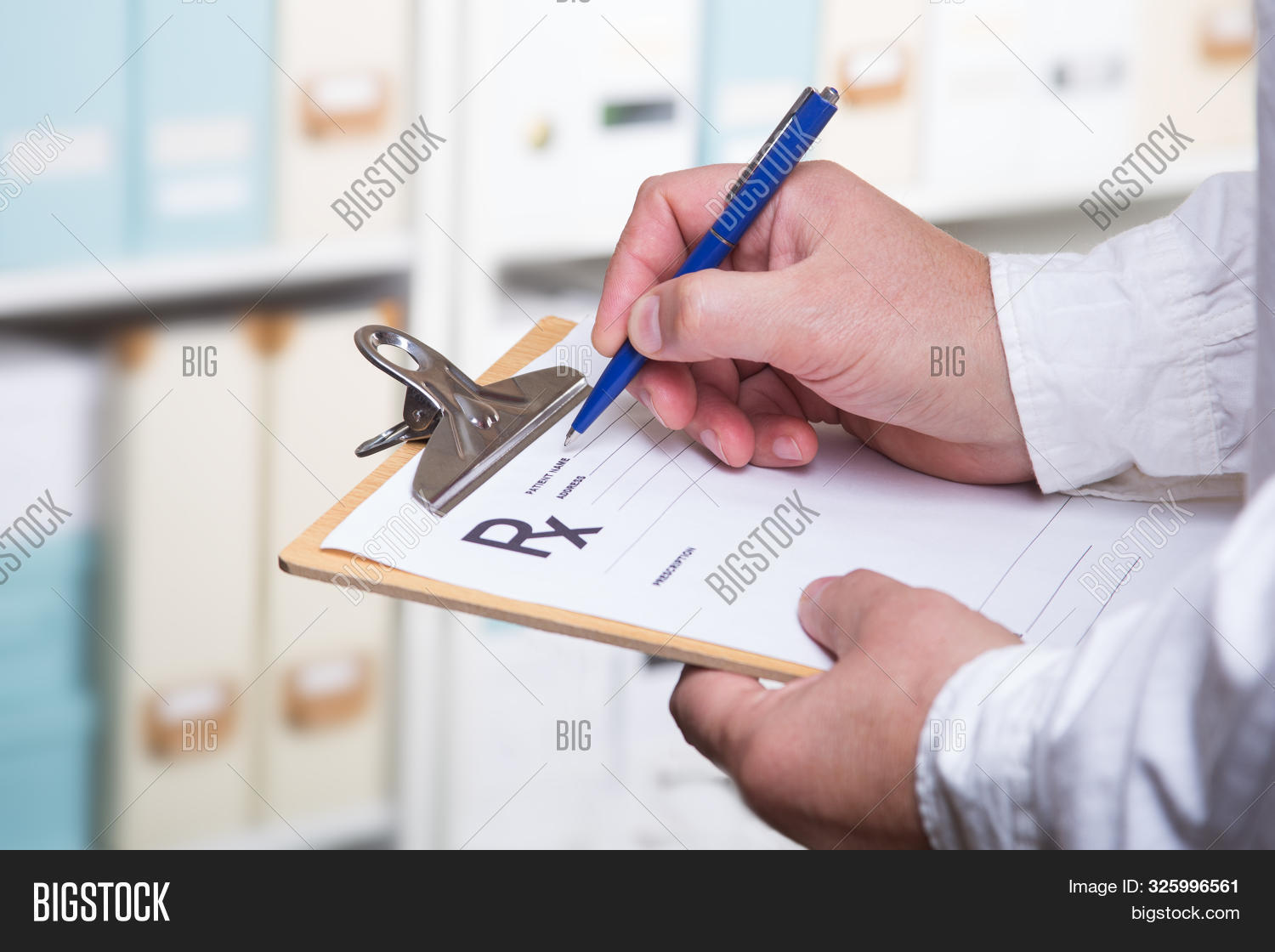 Male Doctor Filling Image & Photo (Free Trial) | Bigstock