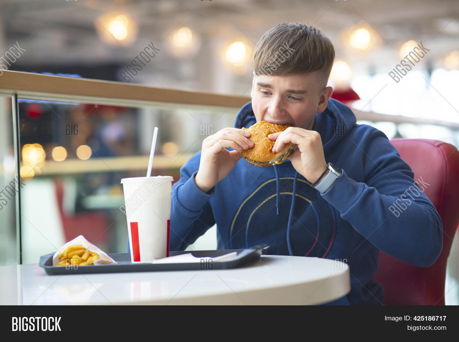 Sad Young Guy Eats On Image & Photo (Free Trial) | Bigstock
