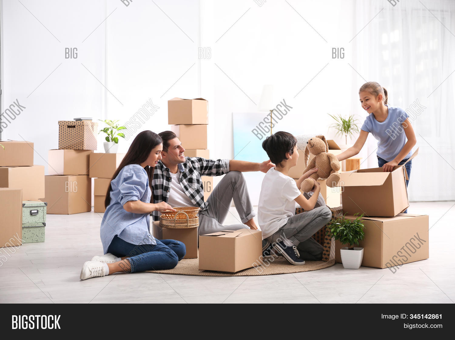 Happy Family Unpacking Image & Photo (Free Trial) | Bigstock