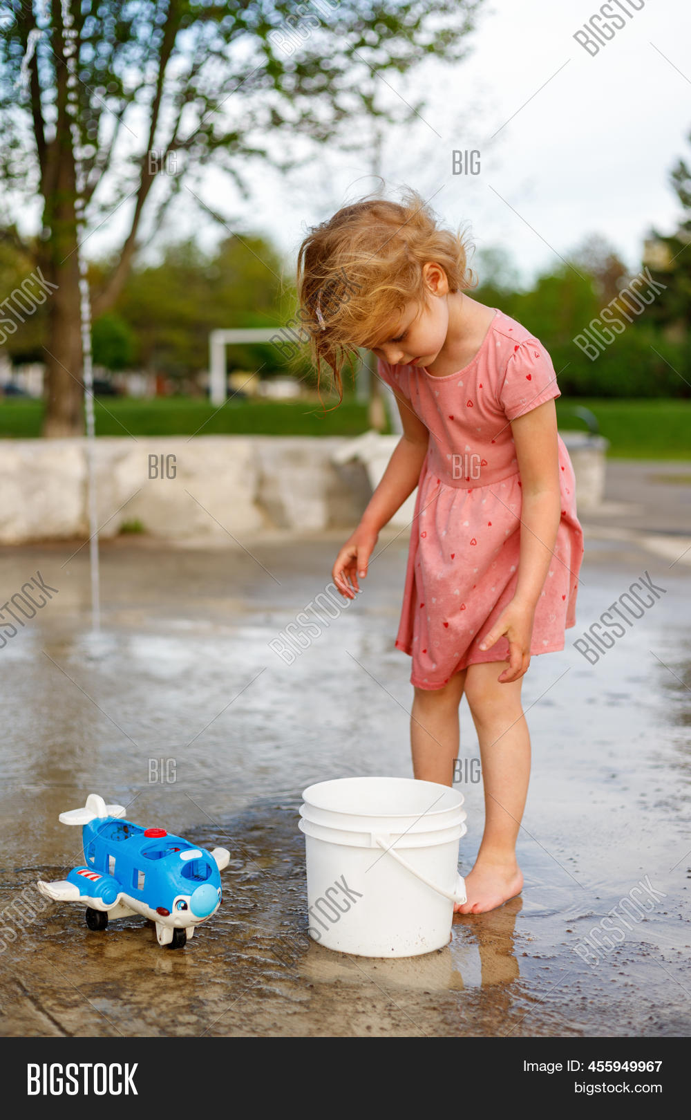 Little Girl Playing Image & Photo (Free Trial) | Bigstock