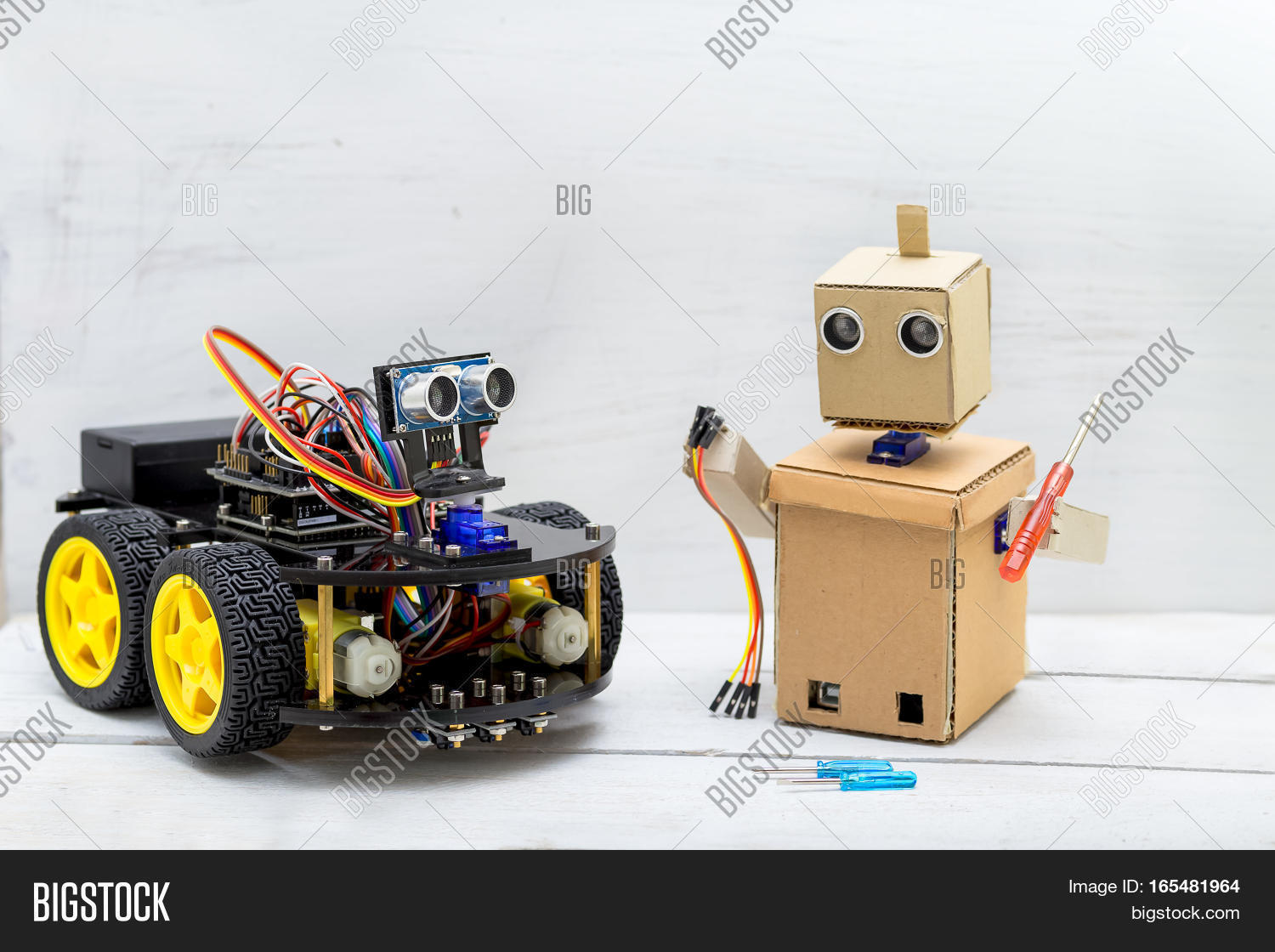Two Robots On Table Image & Photo (Free Trial) | Bigstock