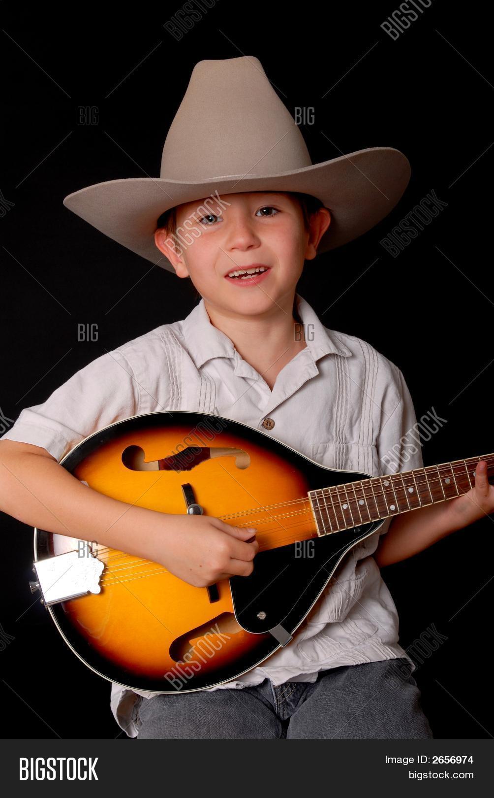 Young Cowboy Musician Image & Photo (Free Trial) | Bigstock