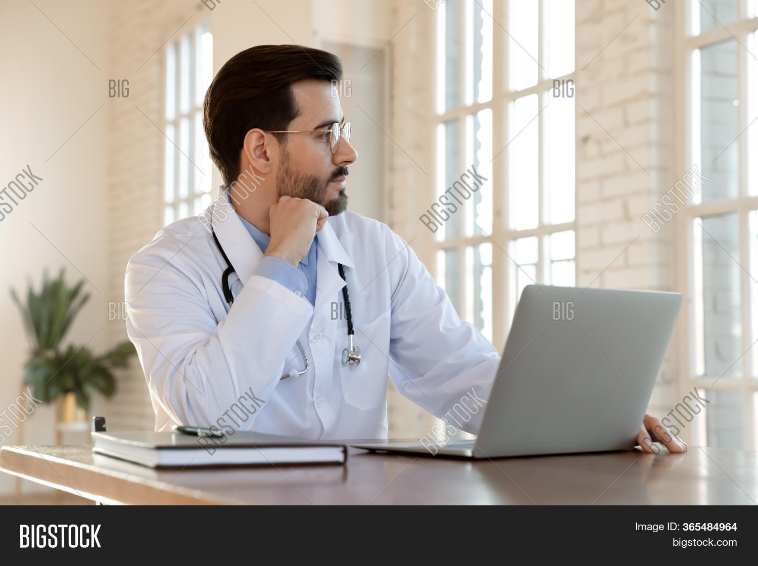 Thoughtful Male Doctor Image & Photo (Free Trial) | Bigstock