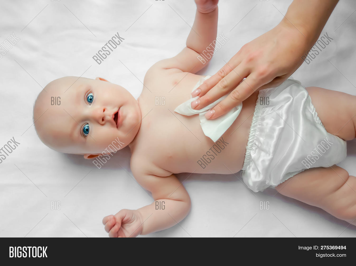 Young Mom Wiping Baby Image & Photo (Free Trial) | Bigstock