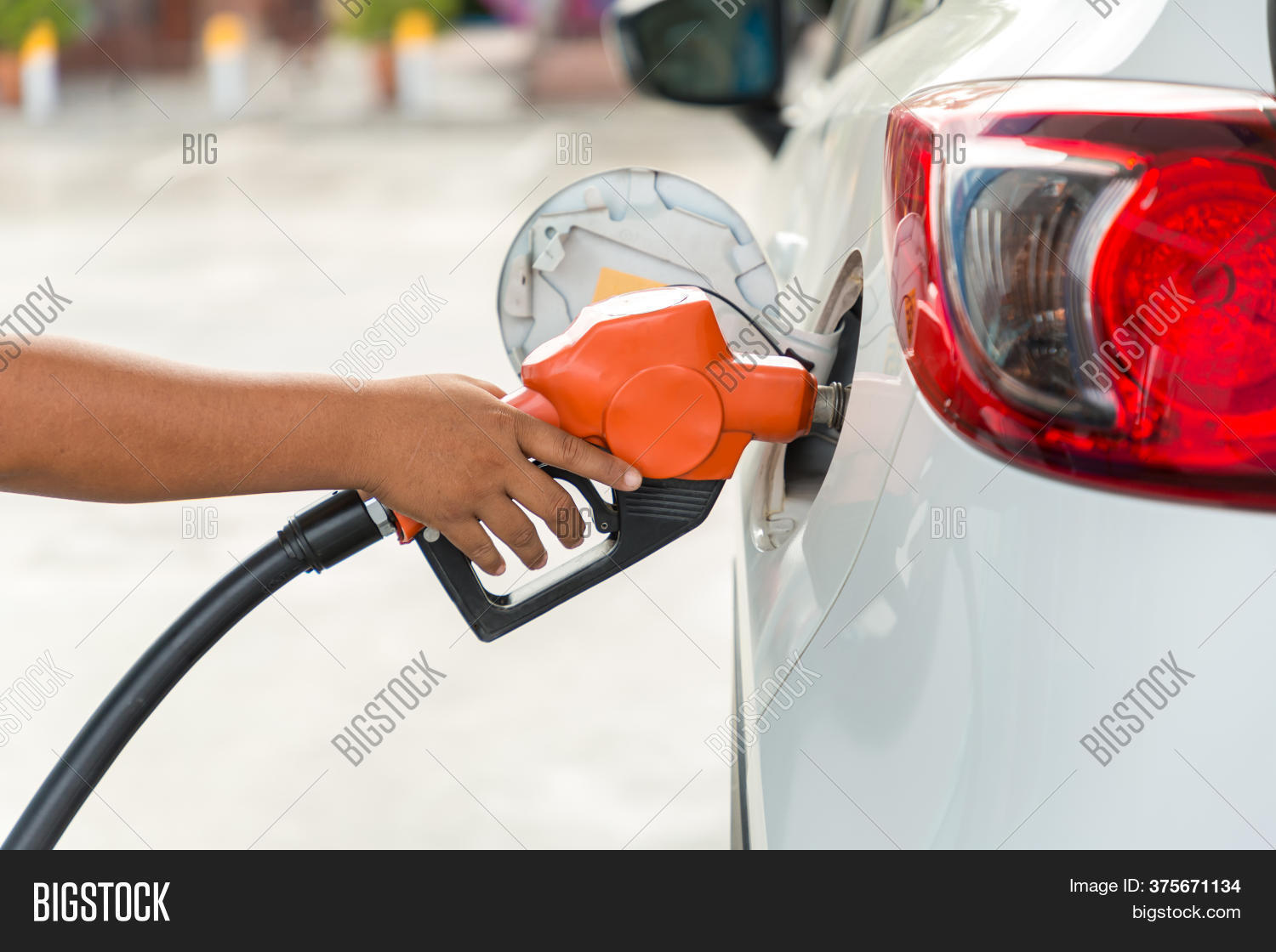 Refill Filling Oil Gas Image & Photo (Free Trial) | Bigstock