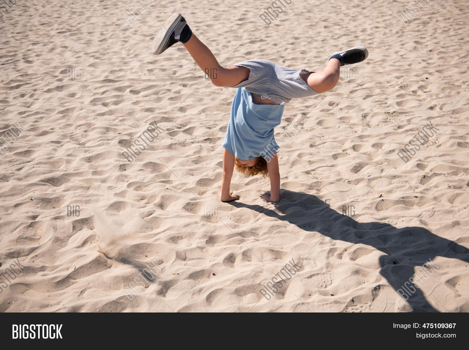 Kid Jumping Upside Image & Photo (Free Trial) | Bigstock
