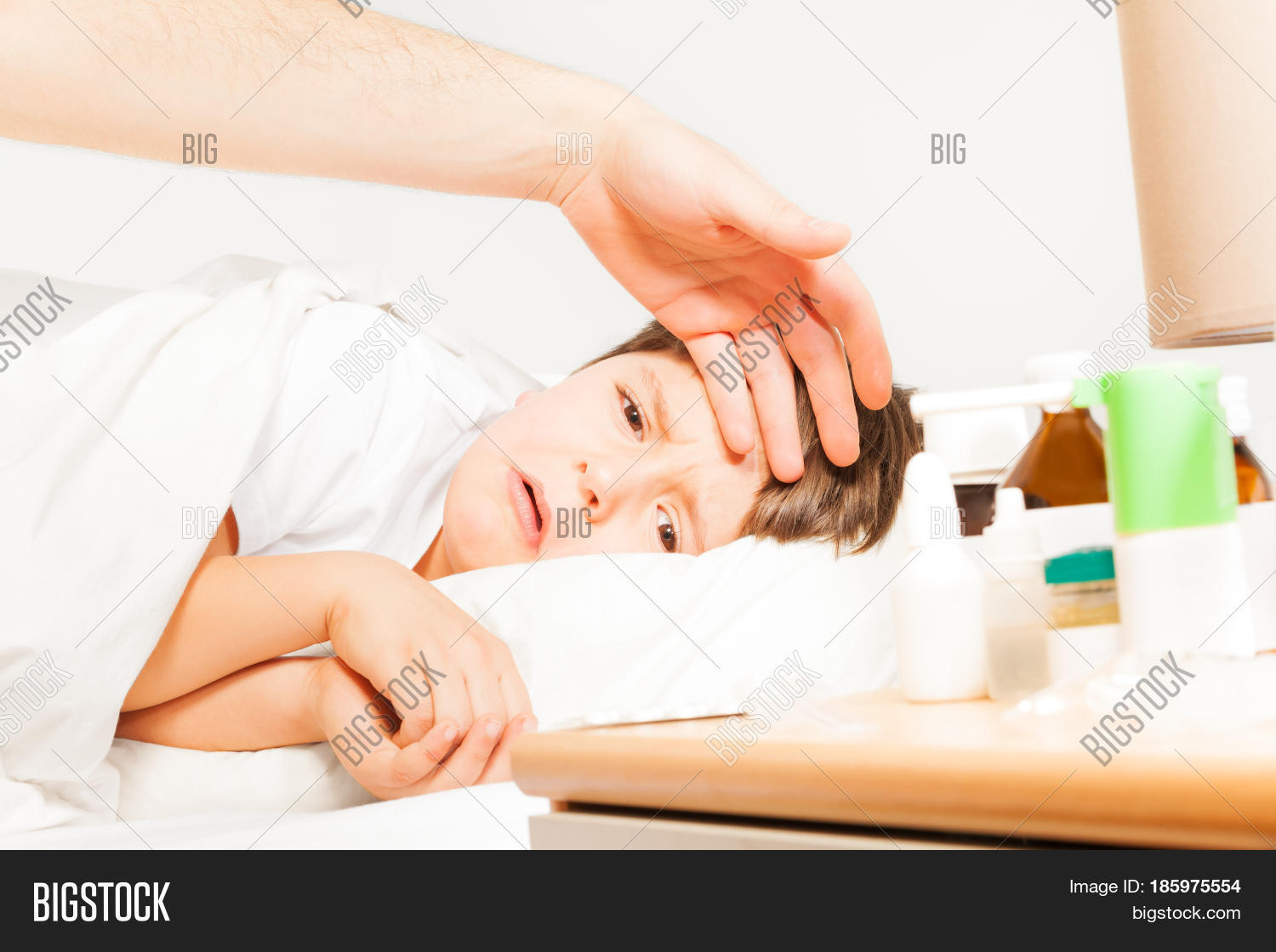 Sick Kid Boy Laying Image & Photo (Free Trial) | Bigstock
