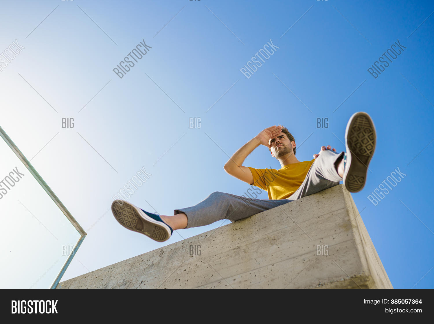 Man Sitting On Ledge Image & Photo (Free Trial) | Bigstock