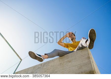 Man Sitting On Ledge Image & Photo (Free Trial) | Bigstock