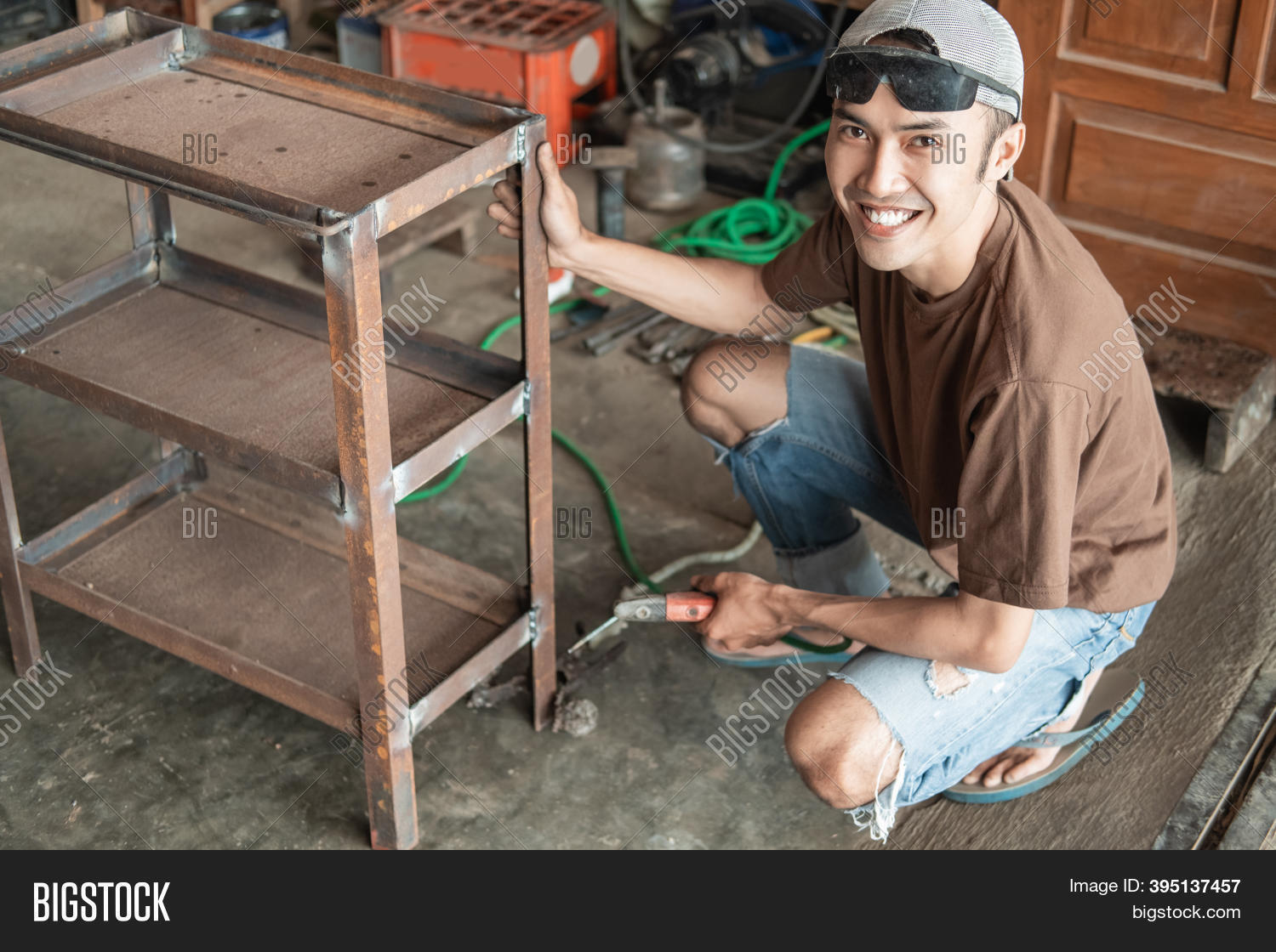 Asian Welder Smiles Image & Photo (Free Trial) | Bigstock